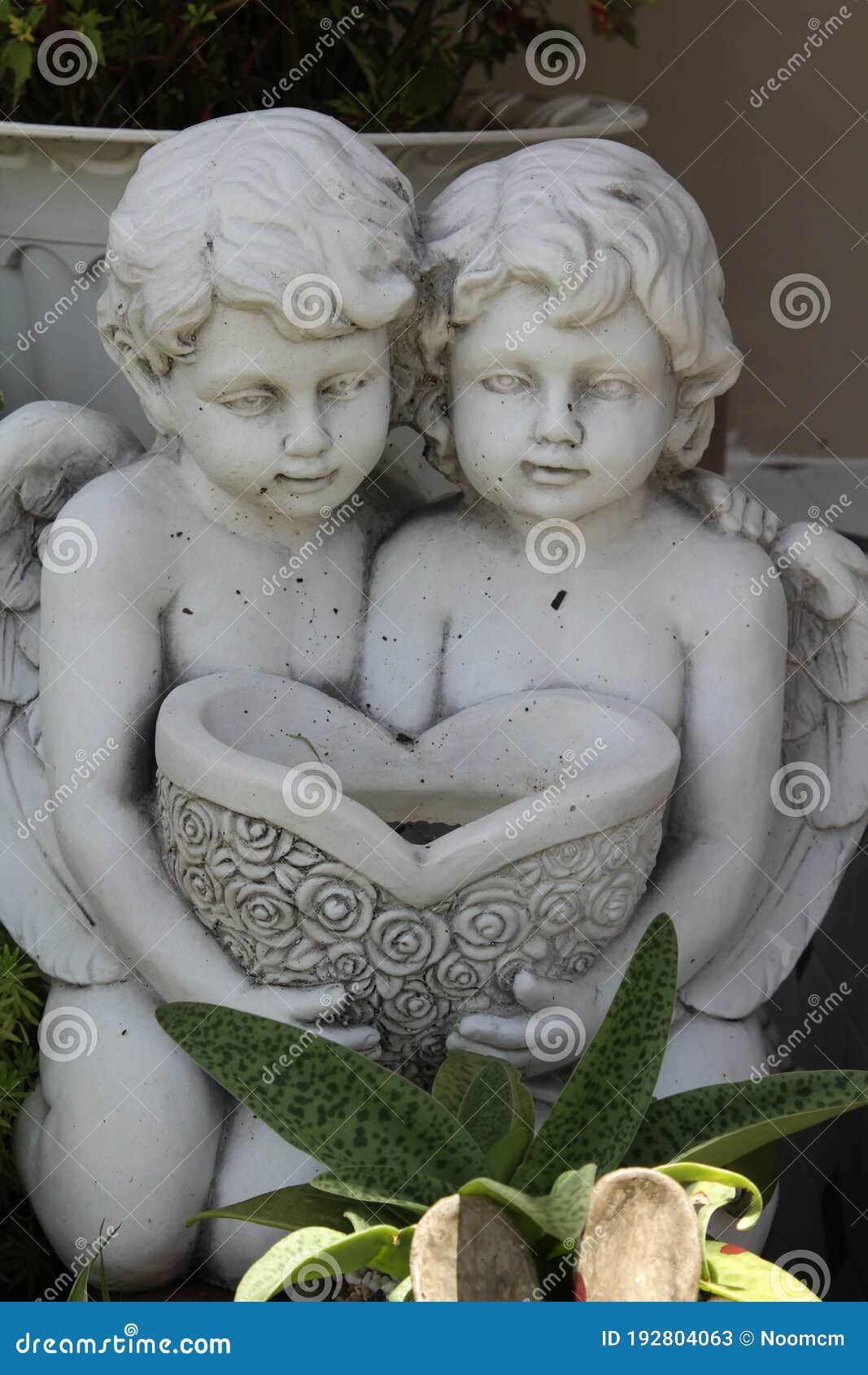 Cupid Statue Decorated in the Garden Stock Image - Image of sculpture ...