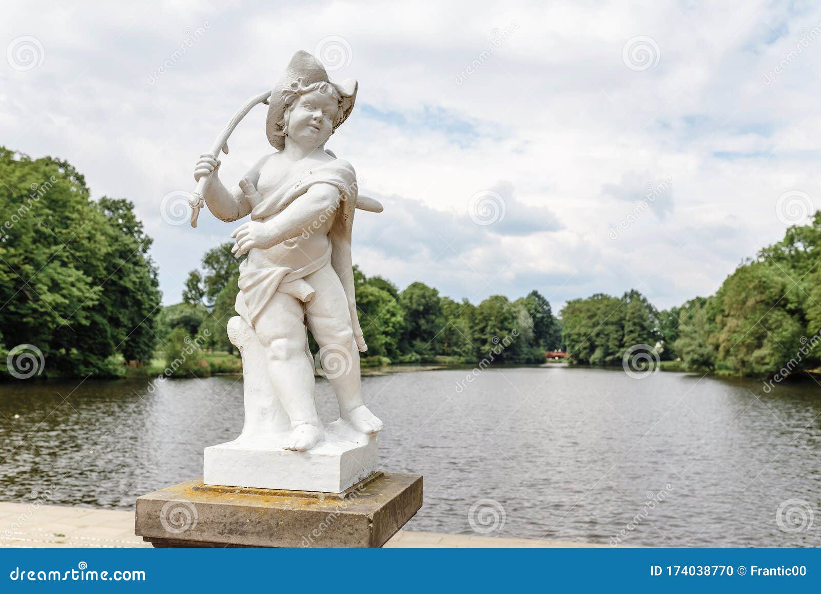 Cupid statue in garden stock photo. Image of classical - 174038770