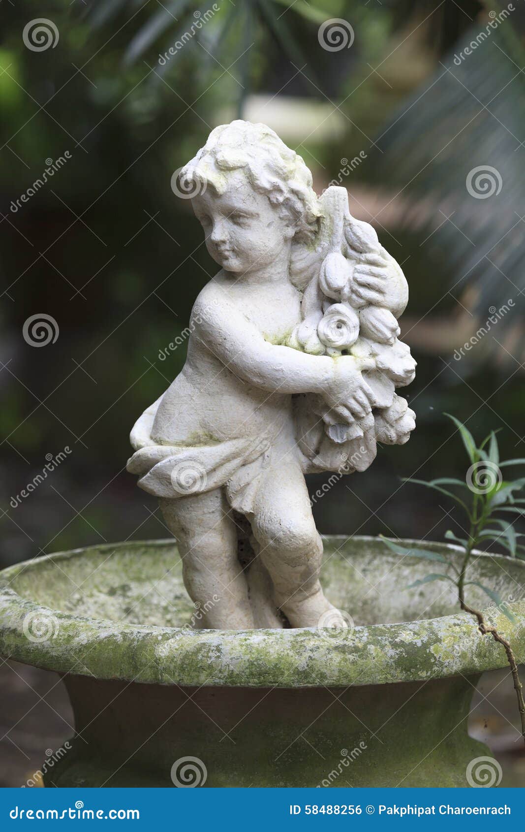 Cupid Statue Sculpture in the Garden. Stock Photo - Image of figurine ...