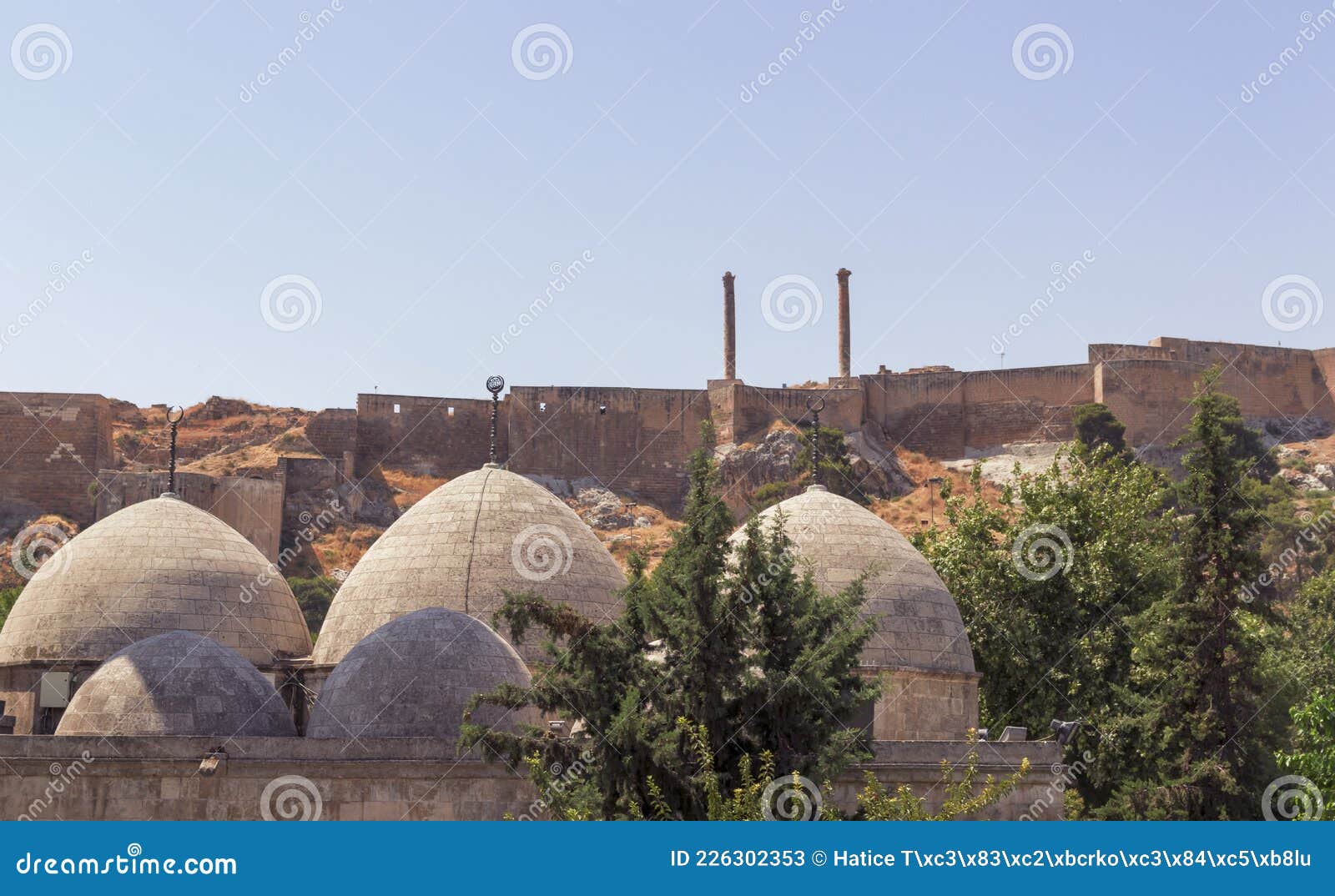 The Cupola and Two Hellenistic Columns Behind the Castle Walls. Stock ...