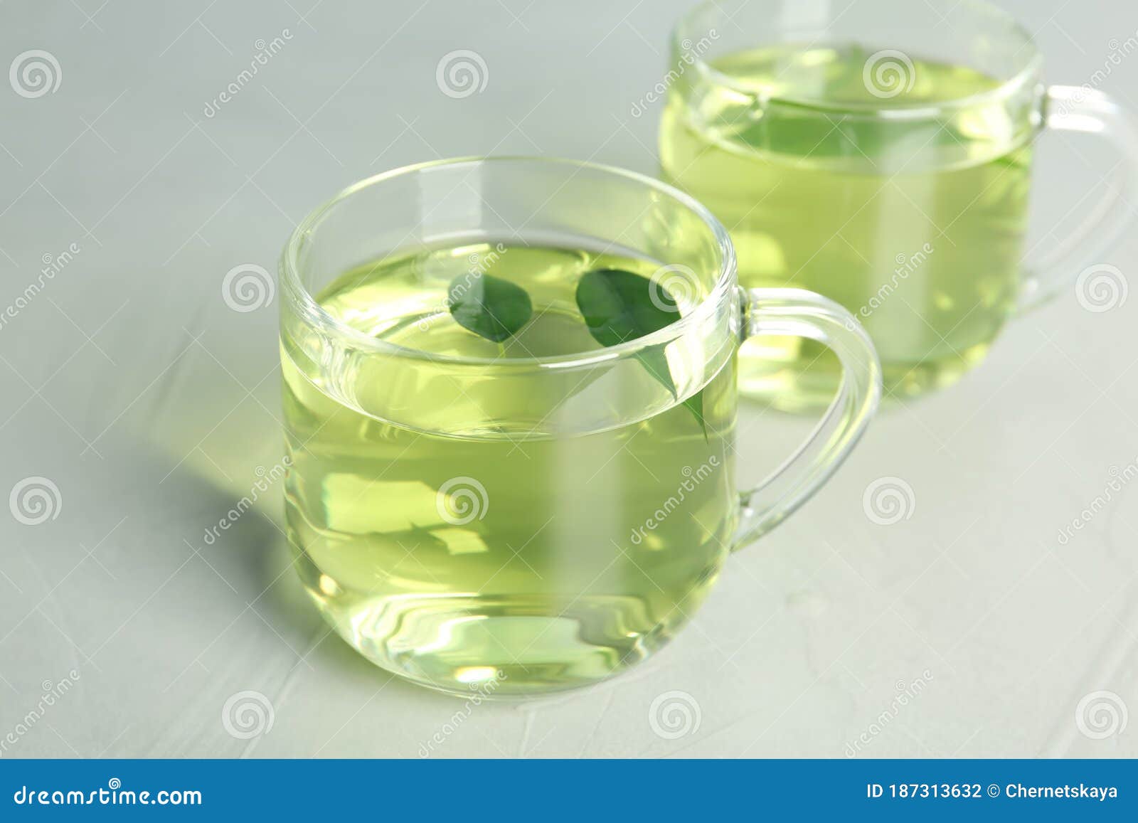 Cups of Aromatic Green Tea on Table Stock Photo - Image of culture ...