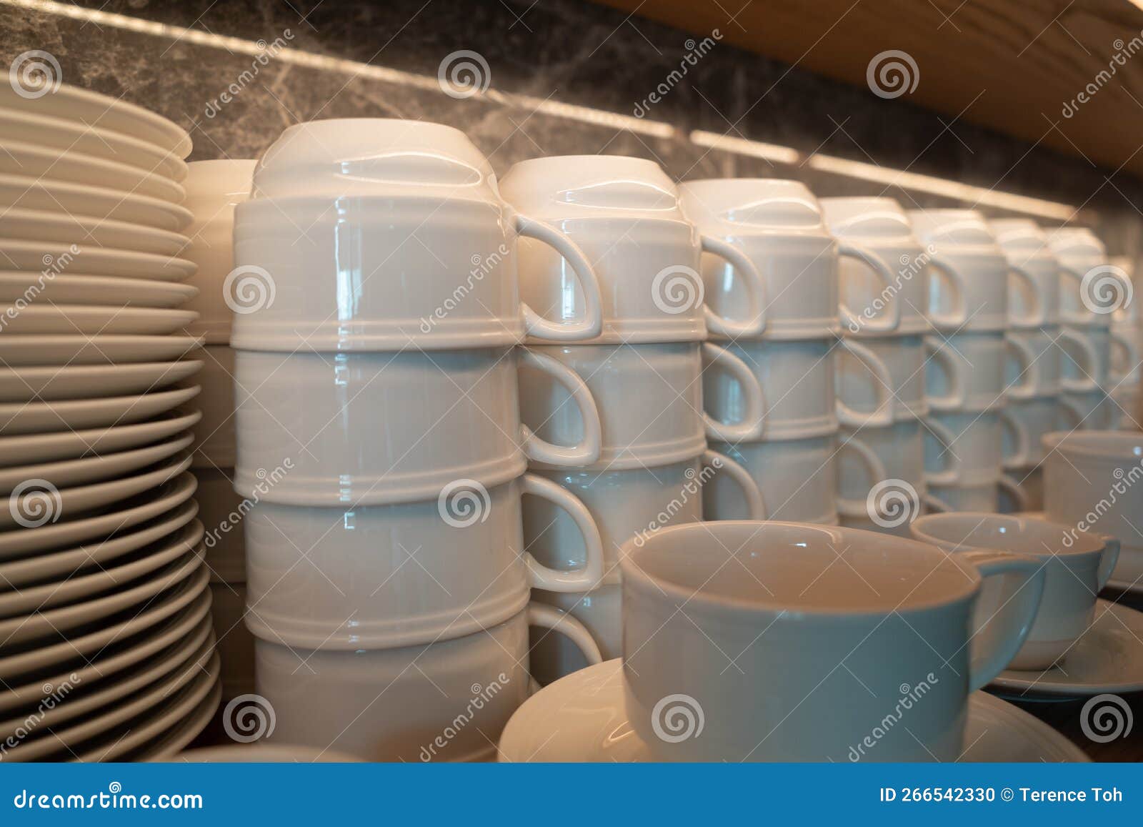 Cups Arranged Properly and Orderly Inside a Cupboard Stock Photo ...