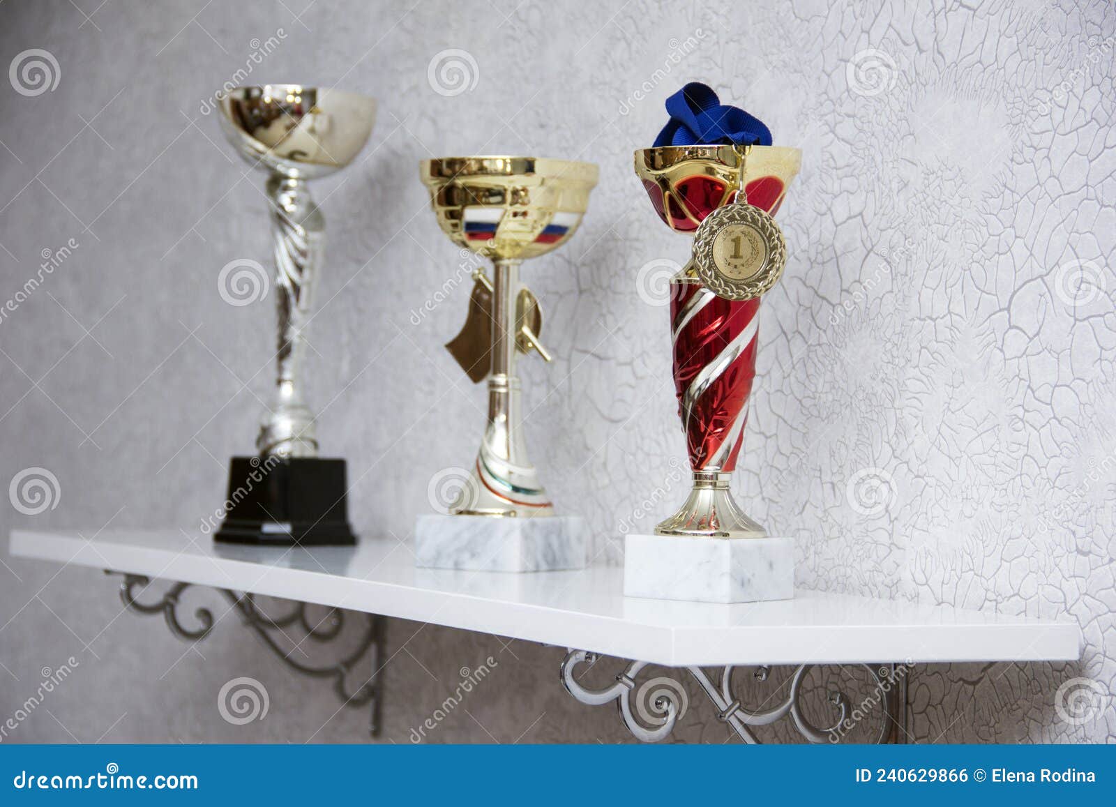 Cups and Awards on the Shelf. the Prize is a Trophy for the Winner of ...