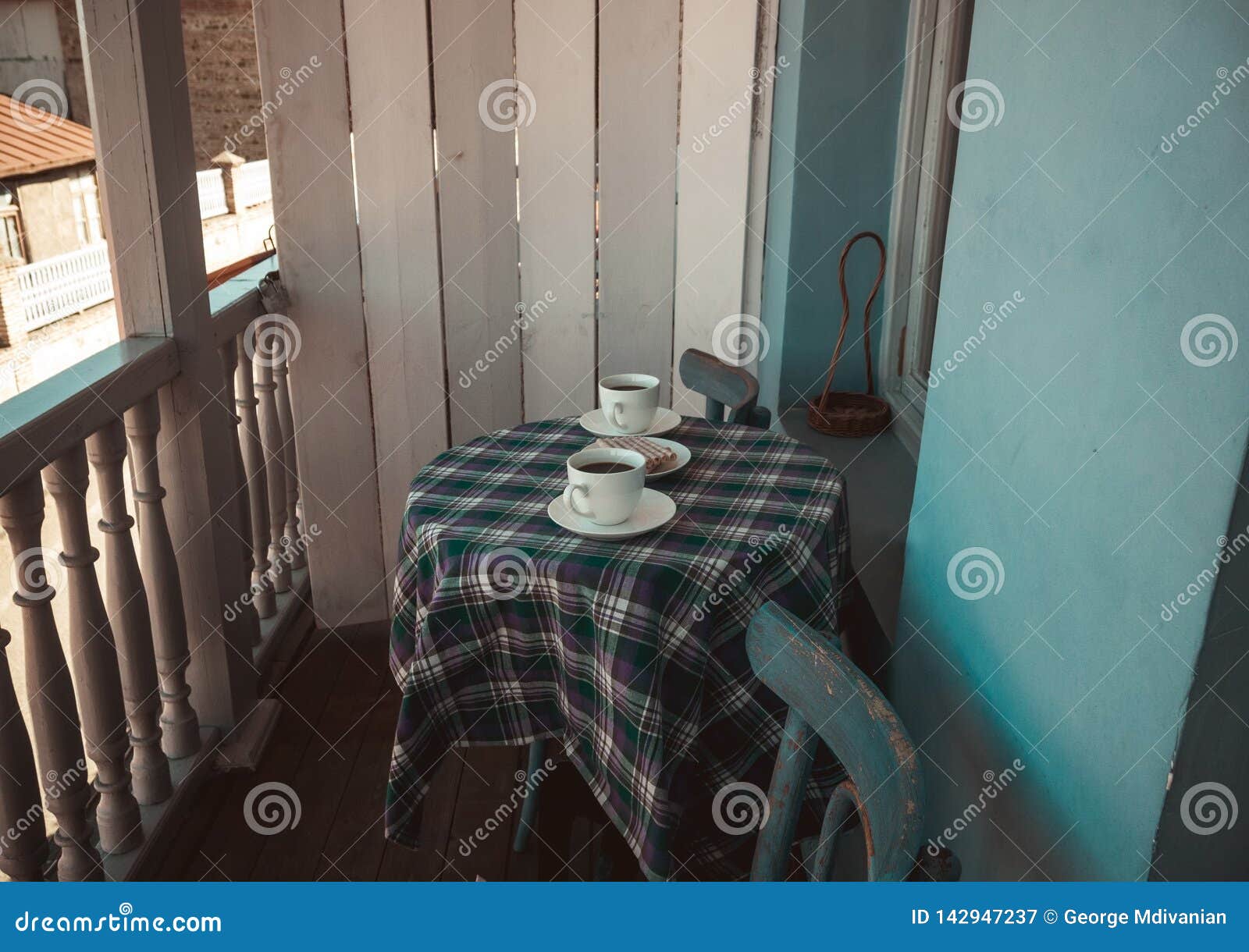 Cups of coffee on balcony stock image. Image of coffee - 142947237
