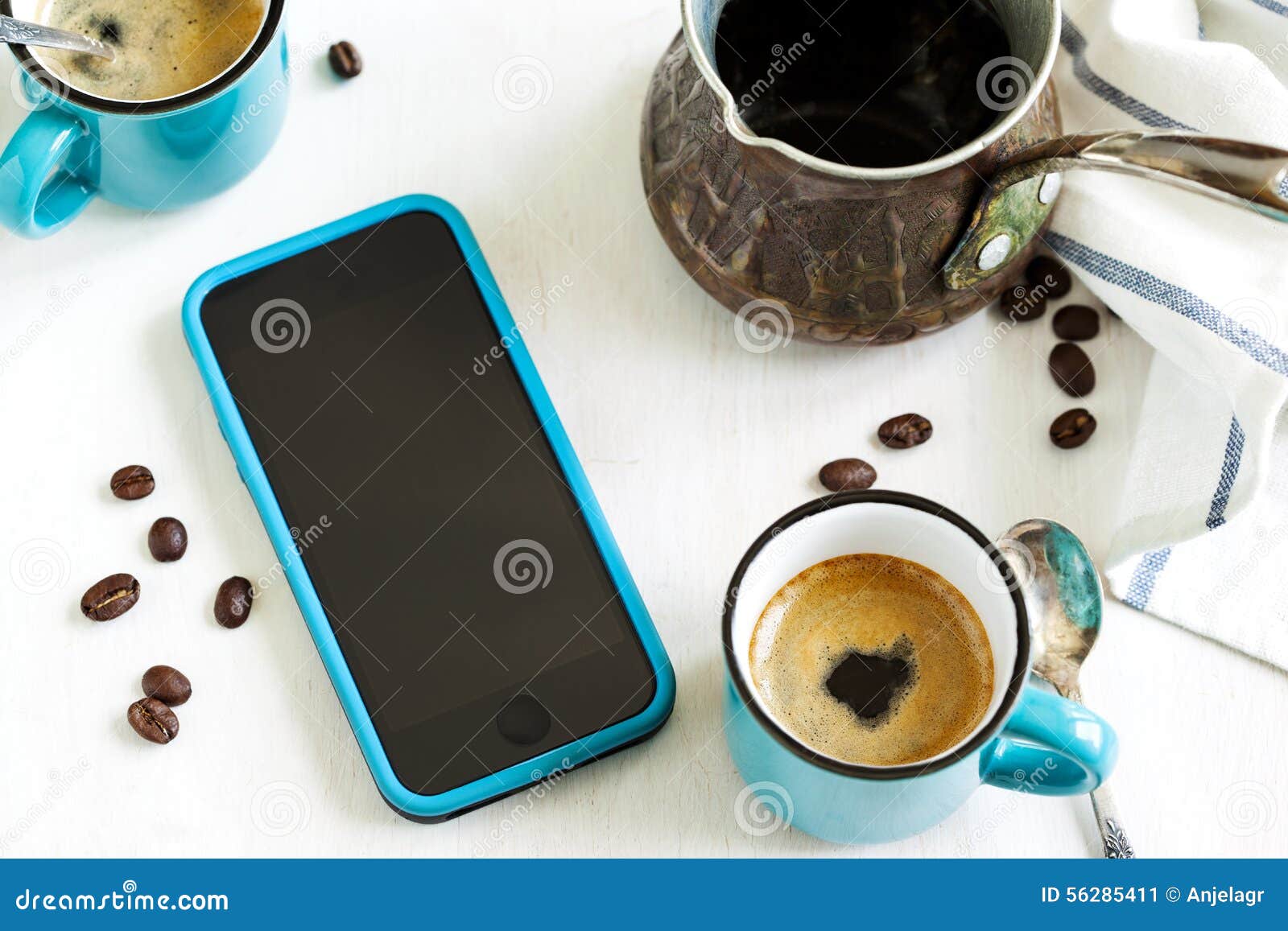 Cups of Coffee and Cellphone on Table Stock Image - Image of ...