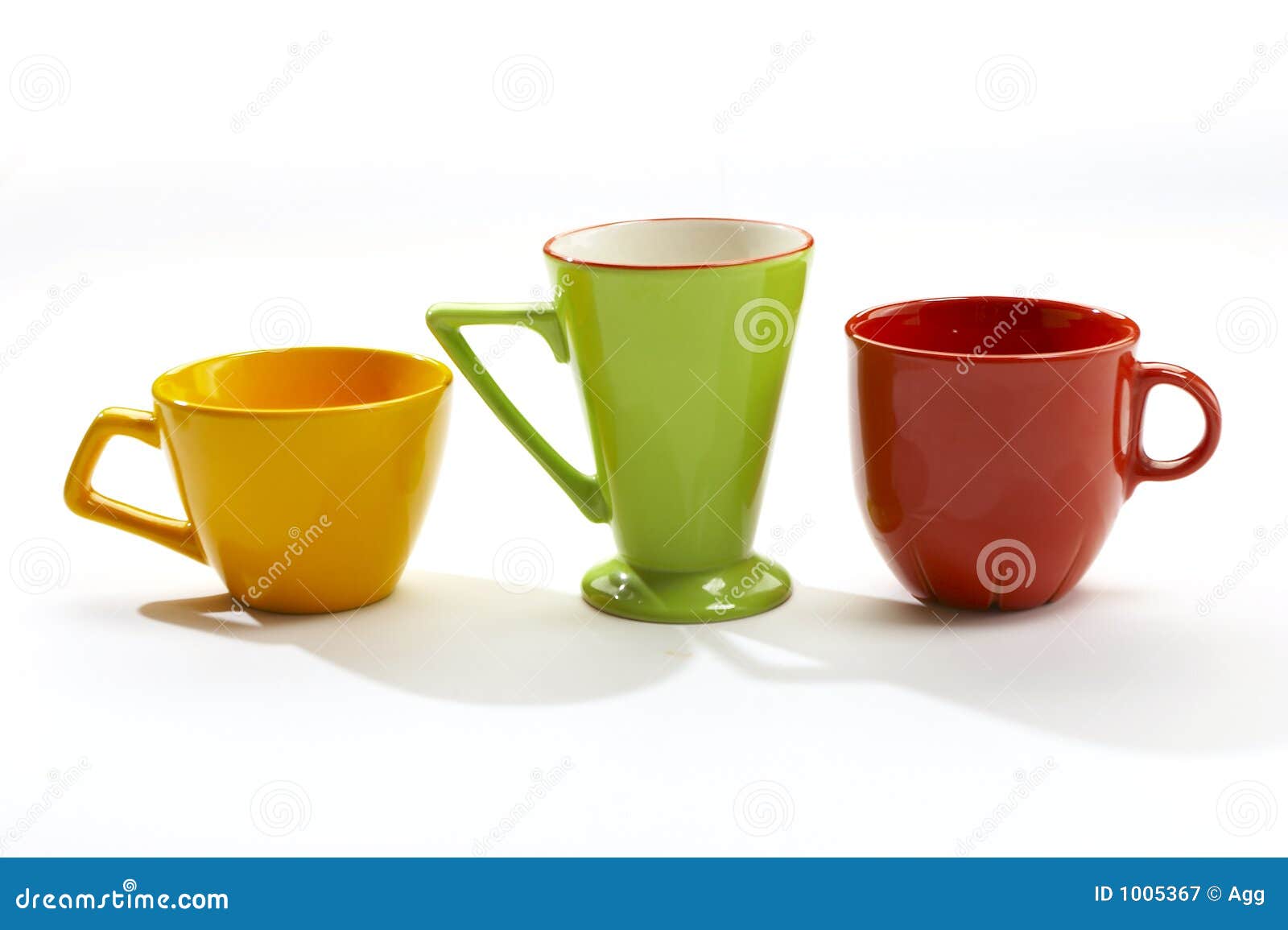 Cups of different colors stock image. Image of form, beverages - 1005367