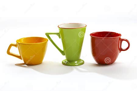 Cups of different colors stock image. Image of form, beverages - 1005367