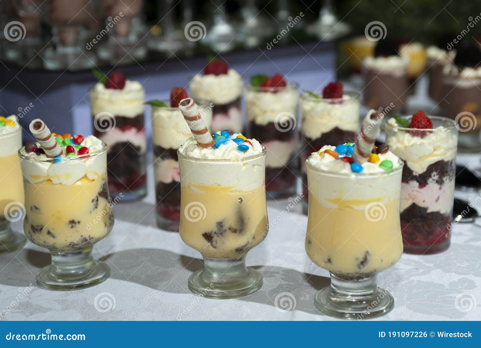 Cups Full of Ice Creams and Sweet Drinks on a White Table Stock Photo ...