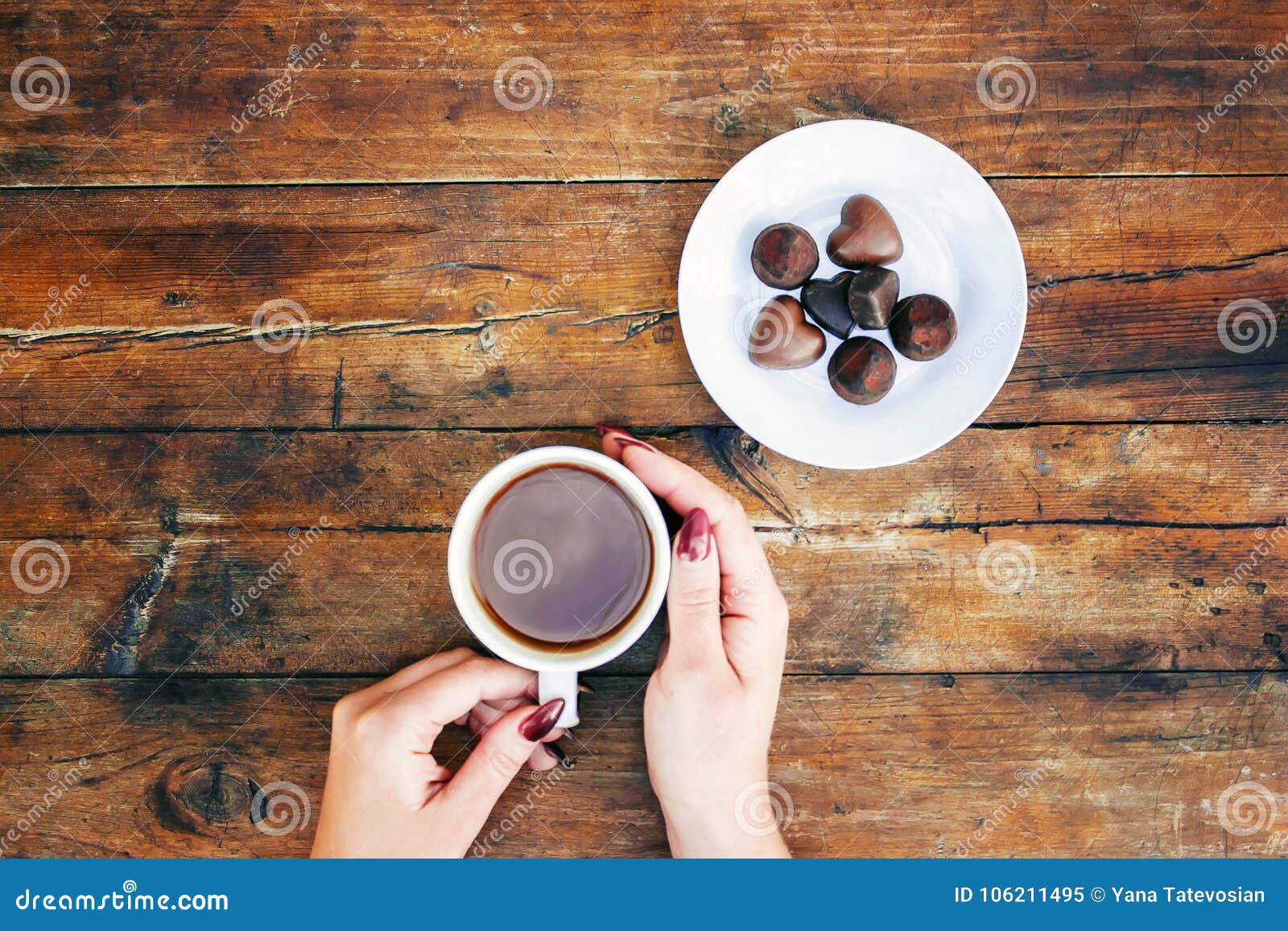 Cups of tea in the hands stock image. Image of care - 106211495