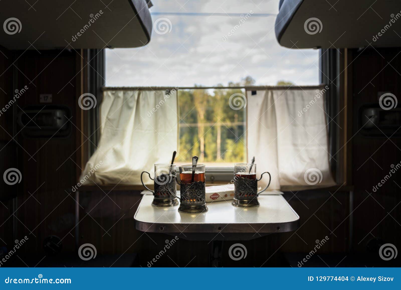 Cups of Tea on the Table in the Train Stock Photo - Image of coupe ...