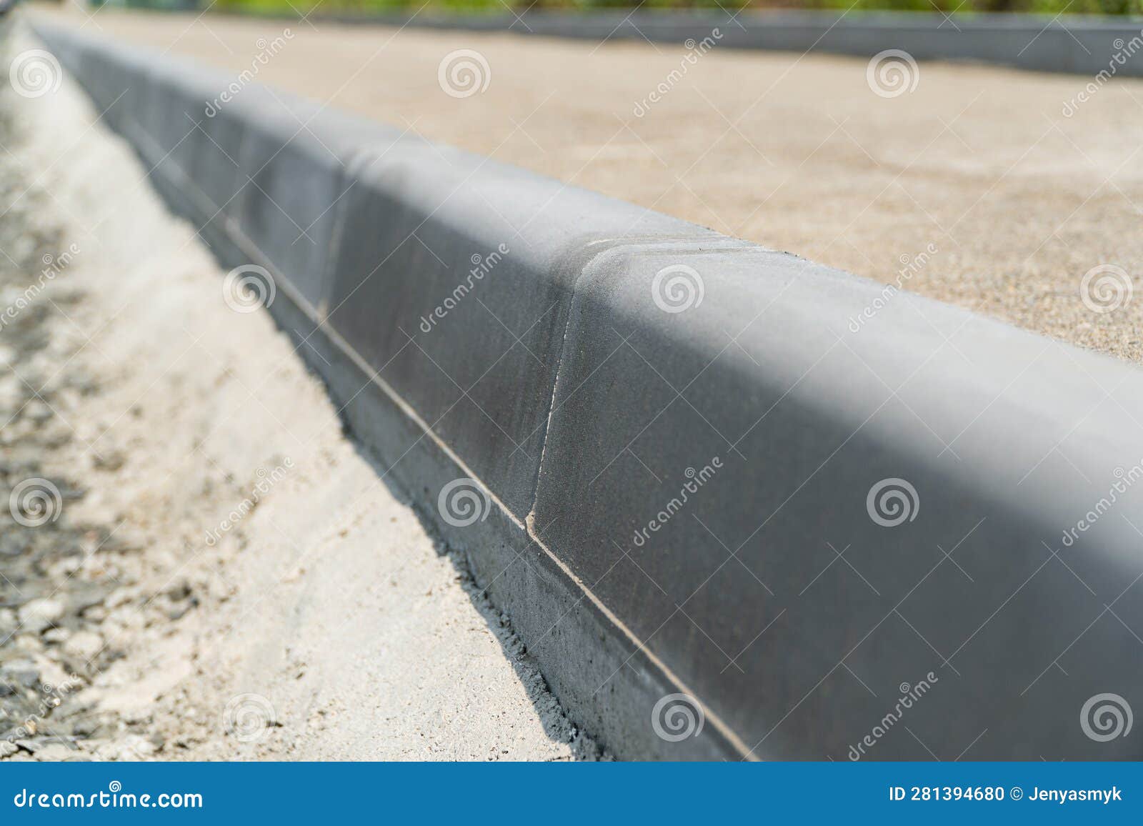 Curb Stone. Installation of Concrete Curb into Concrete. Construction ...