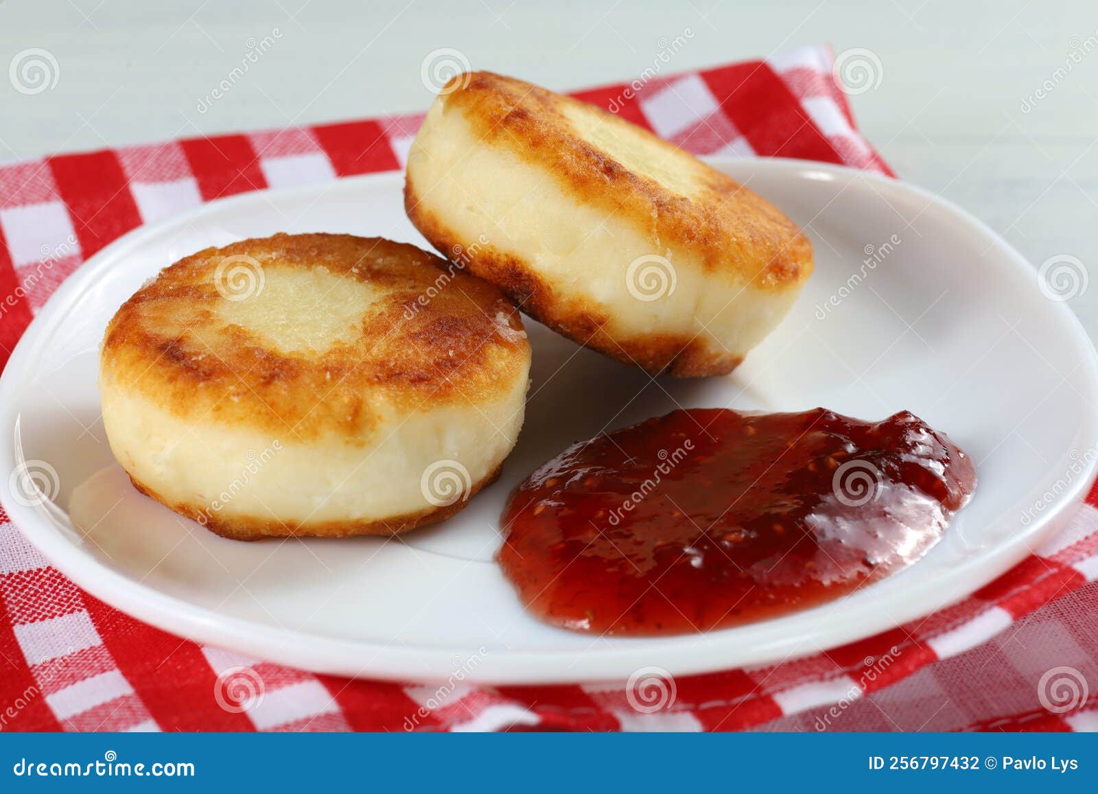 Curd Fritters in a Plate with Raspberry Jam Stock Photo - Image of ...