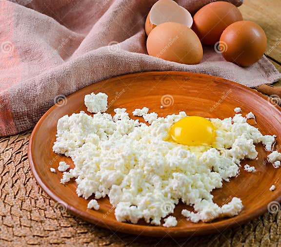 Curds on the brown plate stock image. Image of dessert - 63861009