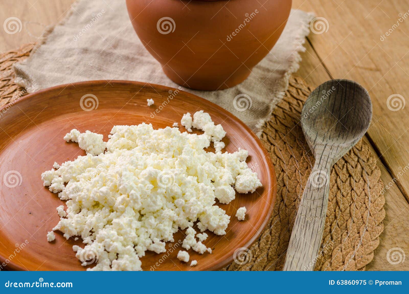 Curds on the brown plate stock image. Image of delicious - 63860975
