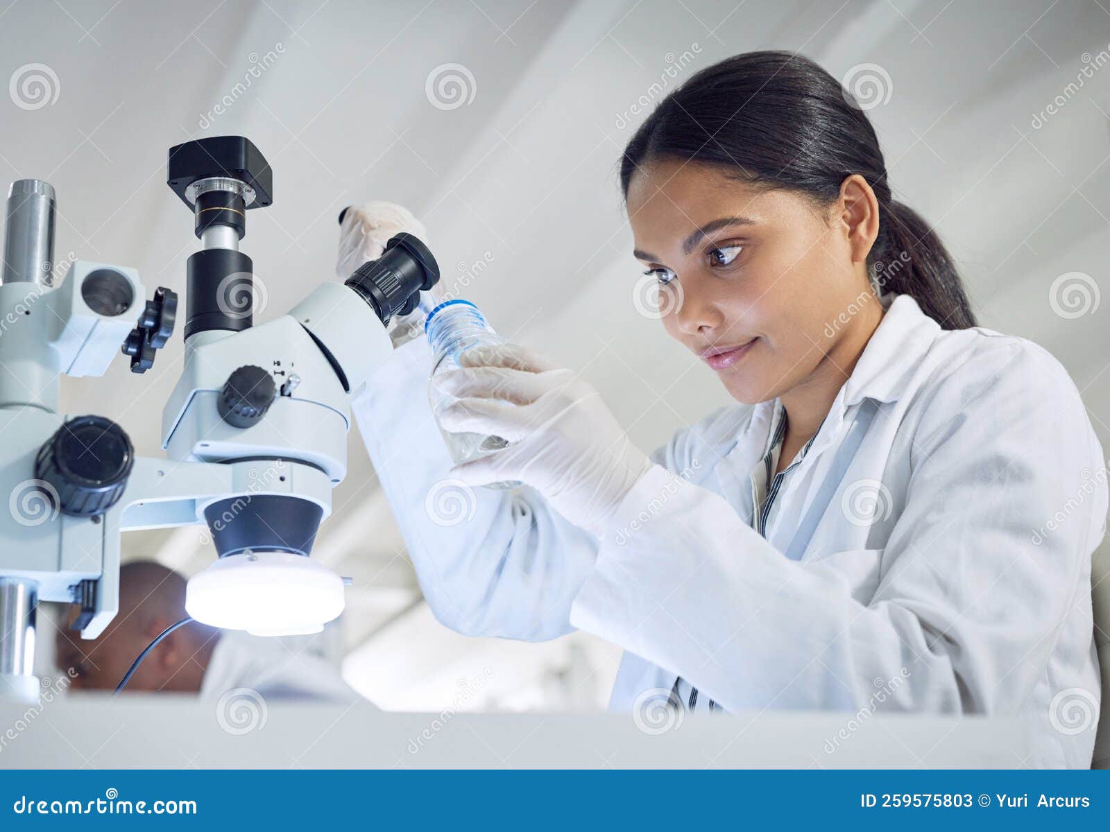 The Cure is almost Ready. a Young Scientist Working in a Lab. Stock ...
