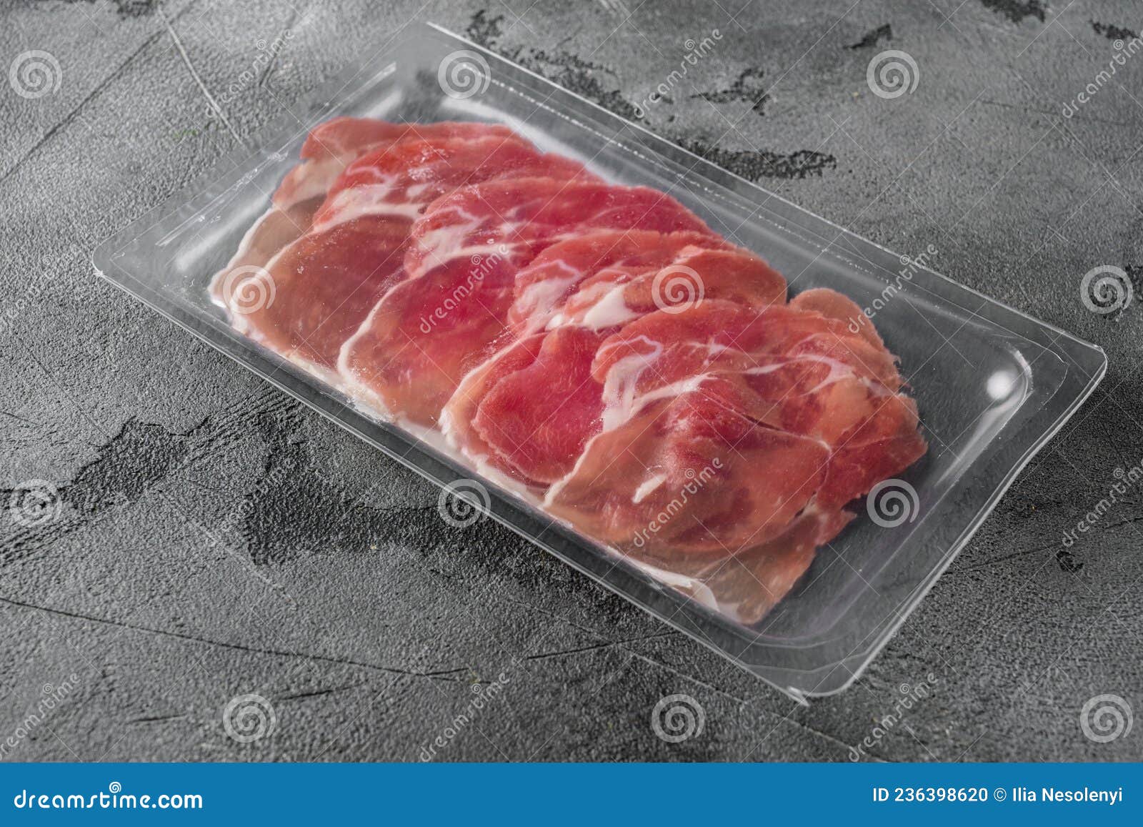 Cured Ham Jamon Vacuum Plastic Pack, on Gray Stone Table Background ...