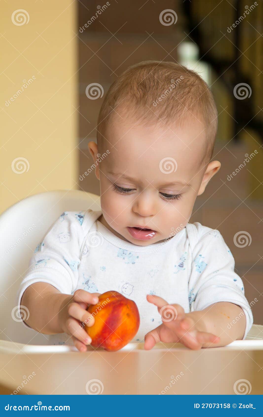 Curious Baby Boy Examines a Peach Stock Photo - Image of examination ...
