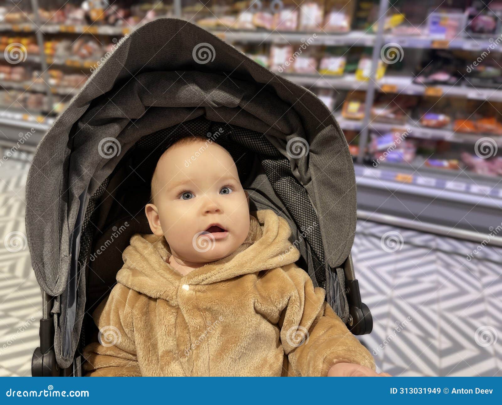 Curious Baby in a Stroller in Supermarket Stock Image - Image of ...