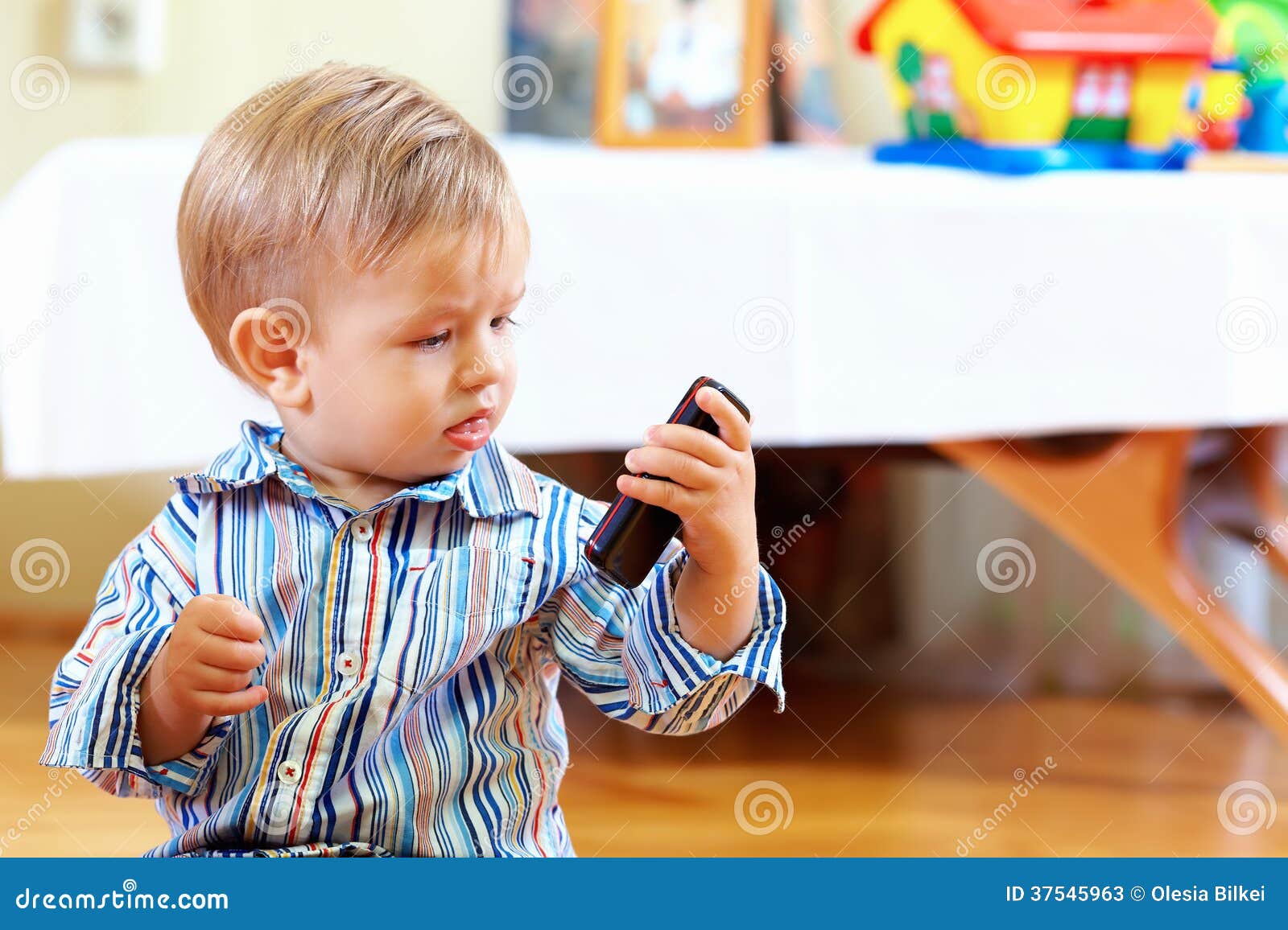 Curious Baby Toddler Exploring Mobile Phone Stock Image - Image of ...