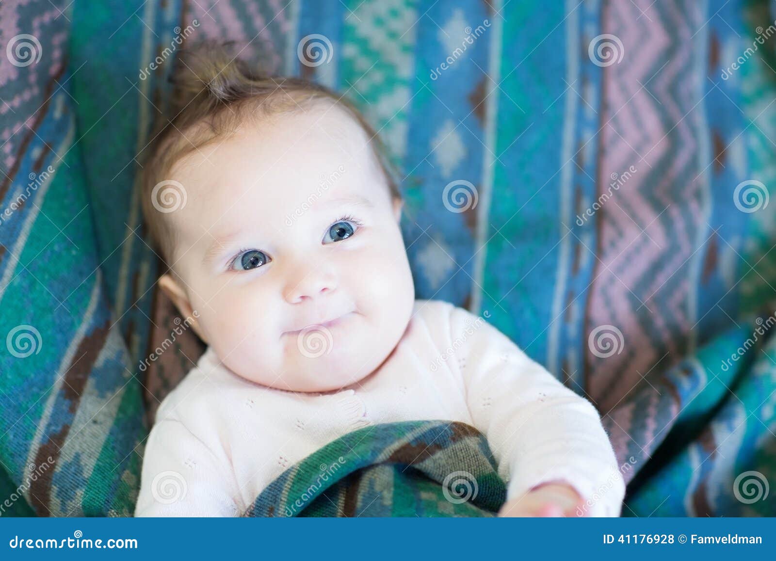 Curious Baby in a Warm Green Blanket Stock Photo - Image of curious ...
