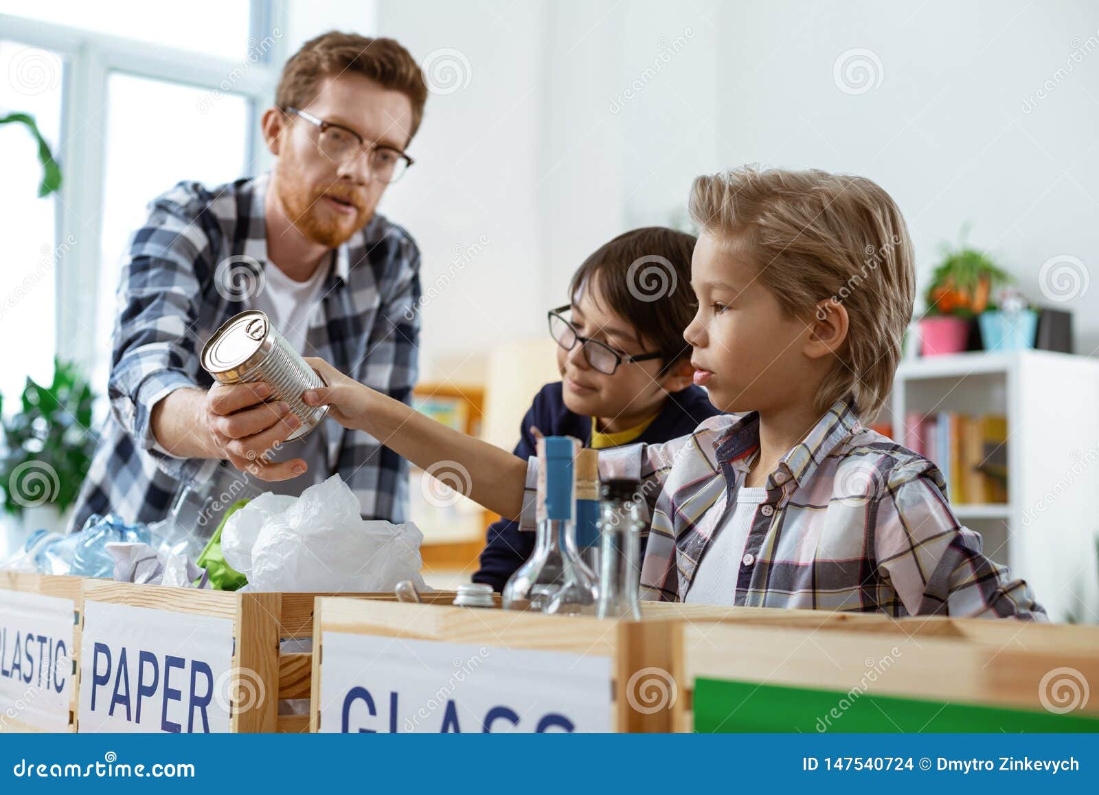 Curious Blonde Boy Placing Garbage into Right Boxes Stock Photo - Image ...