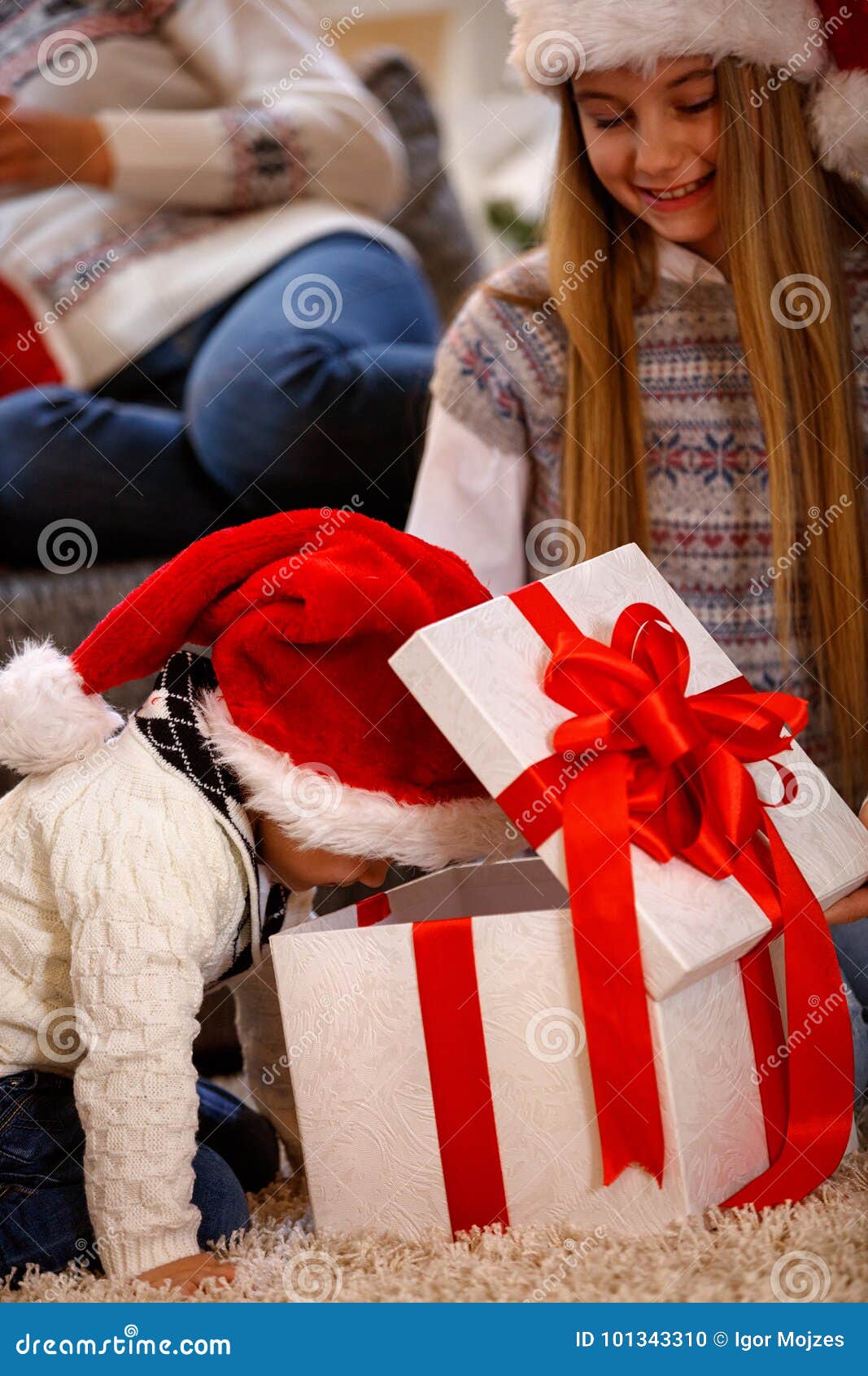 Curious Boy Looking in Box with Christmas Gift Stock Photo - Image of ...