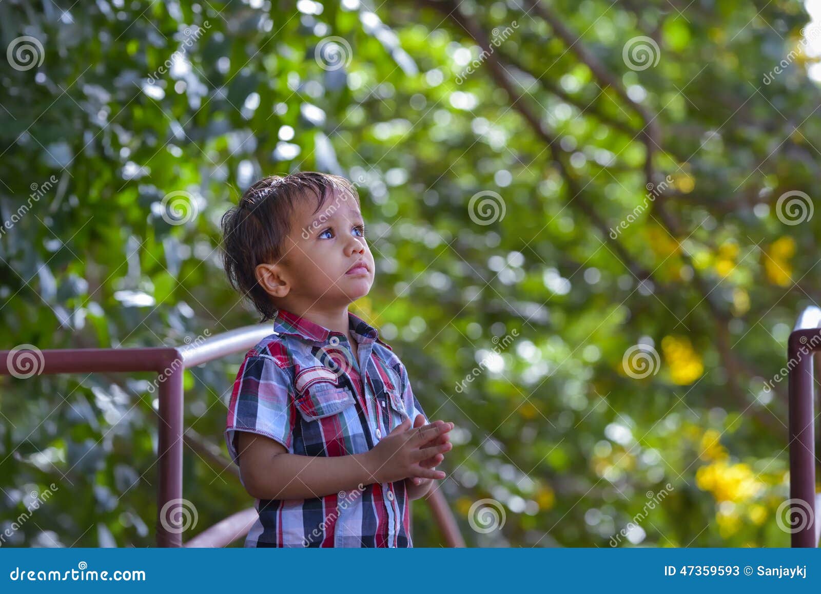 Curious child stock image. Image of look, play, praying - 47359593
