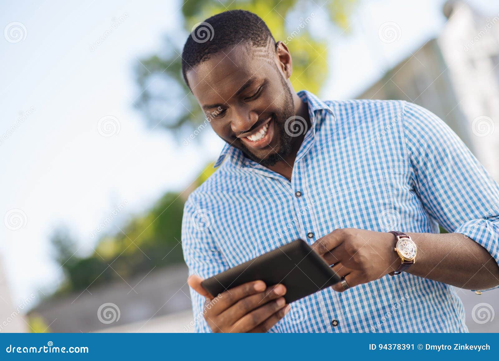 Curious Excited Man Watching Some Fun Stuff on His Gadget Stock Image ...
