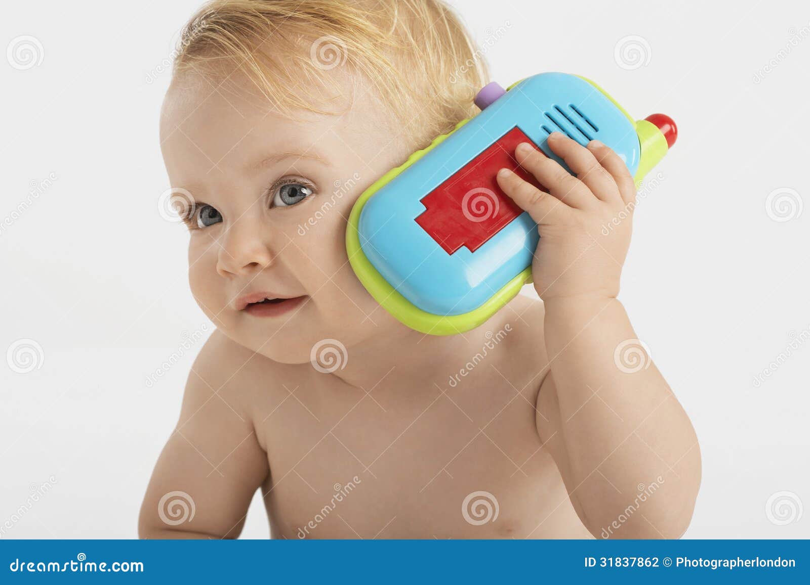 Curious Little Boy Using Toy Phone Stock Photo - Image of horizontal ...