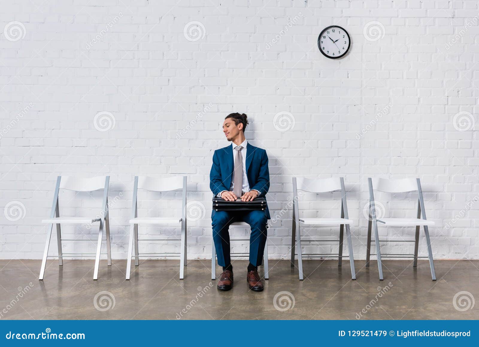 Curious Man with Briefcase Waiting for Interview while Sitting Stock ...