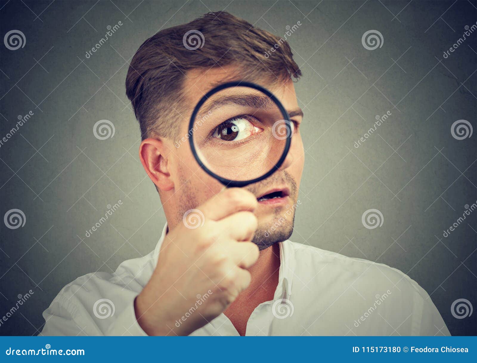 Curious Man Looking through Magnifier Stock Photo - Image of emotion ...