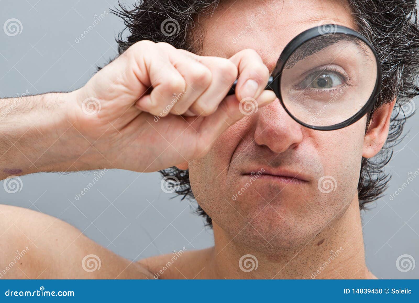 Curious man with magnifier stock photo. Image of attractive - 14839450