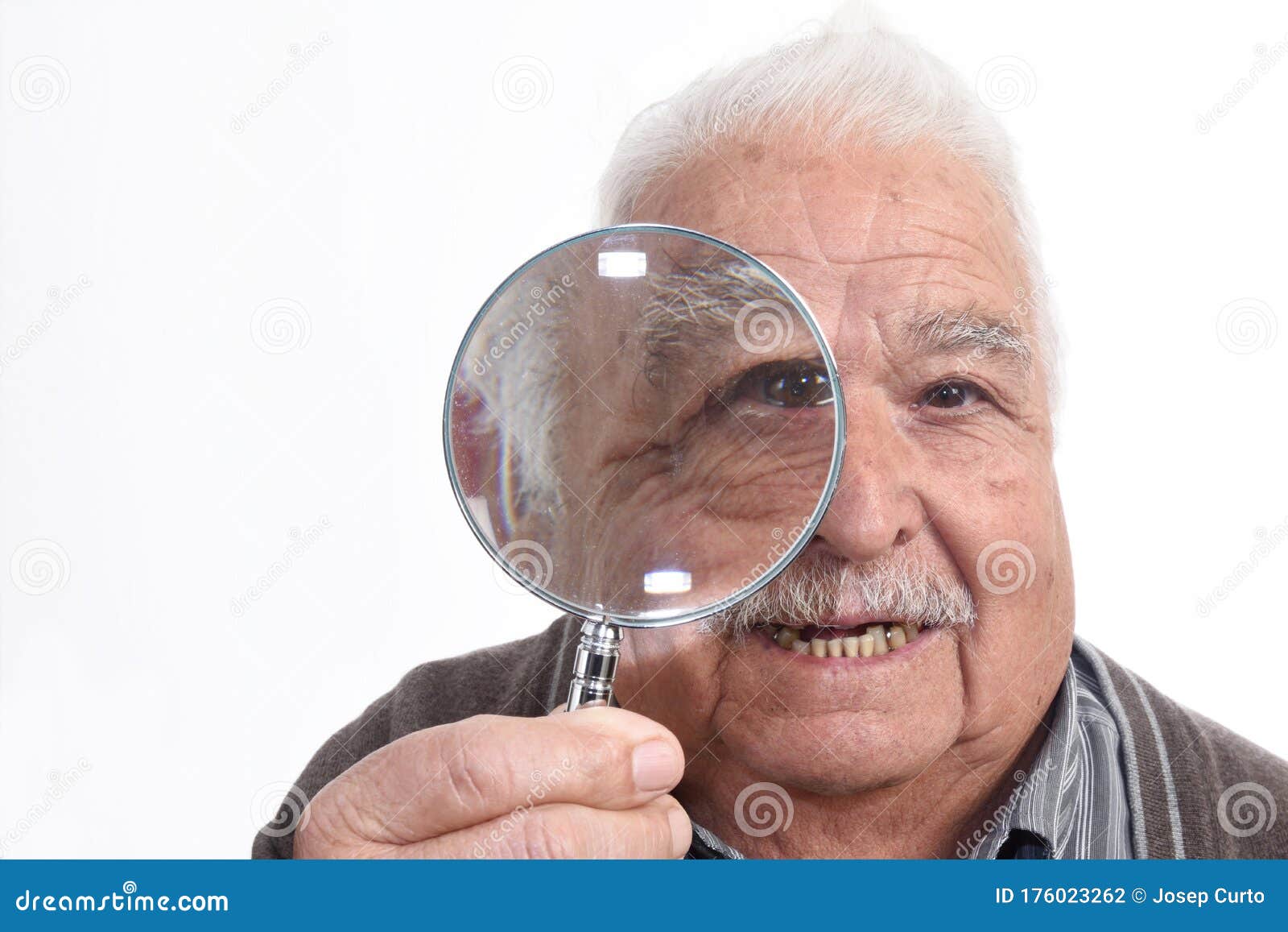 Curious Man Peering through Magnifying Glass Stock Photo - Image of ...