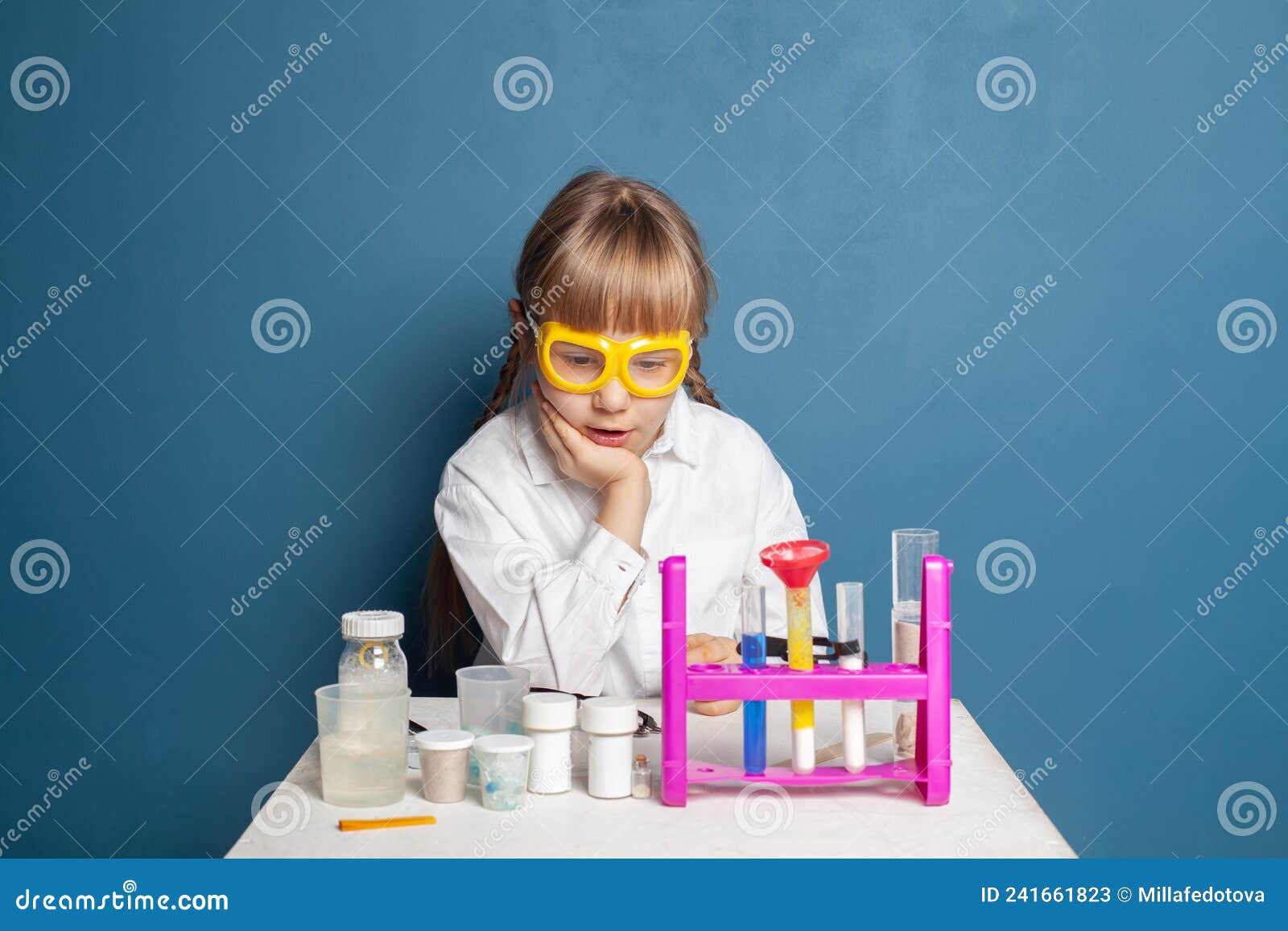 Curious School Child Learning Science and Doing Science Experiment ...