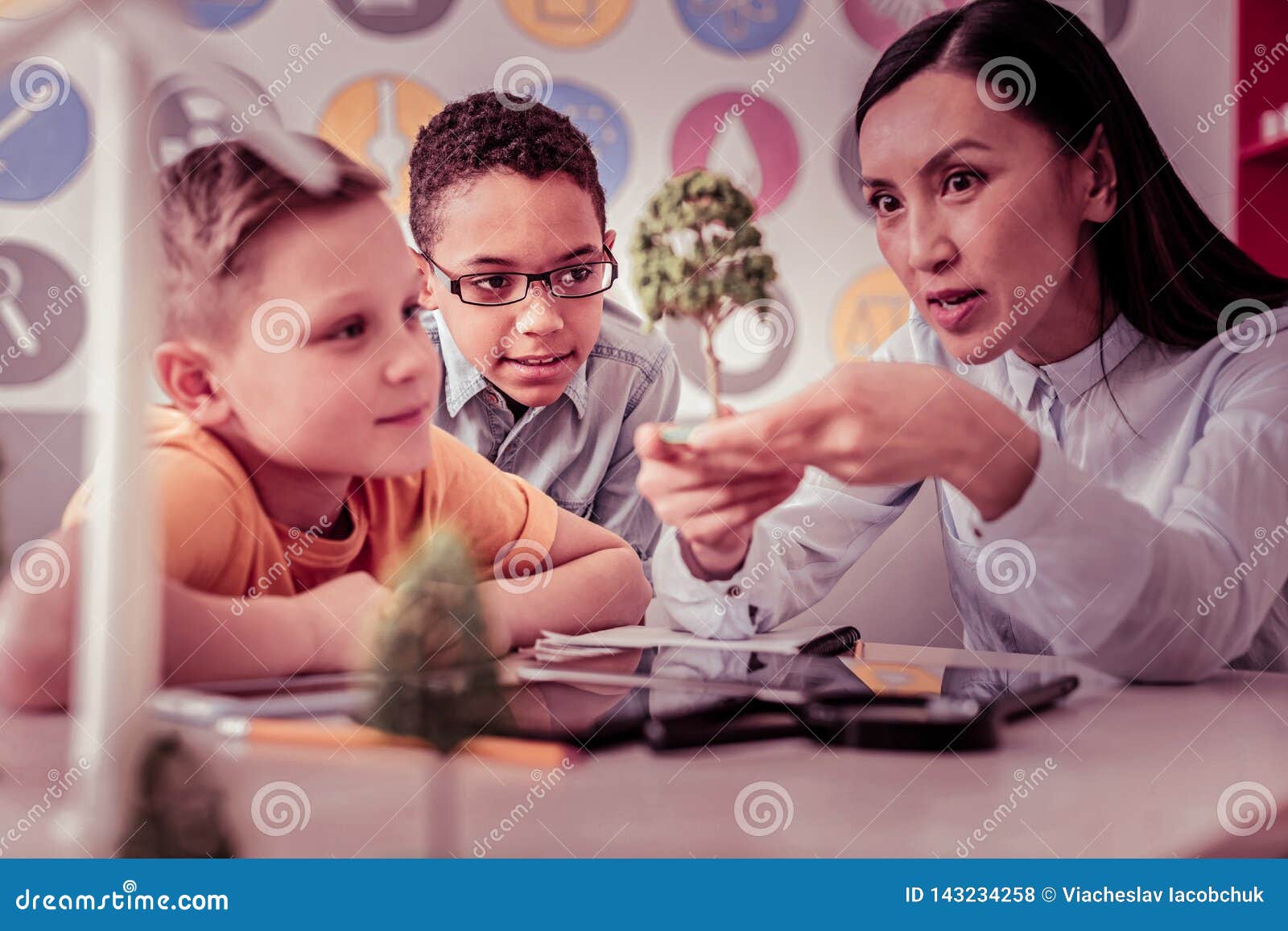 Curious Students Attentively Looking on the Model in Teacher Hands ...