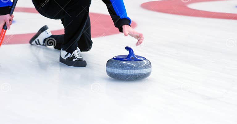 Curling stock image. Image of feet, blue, yellow, players - 12954133