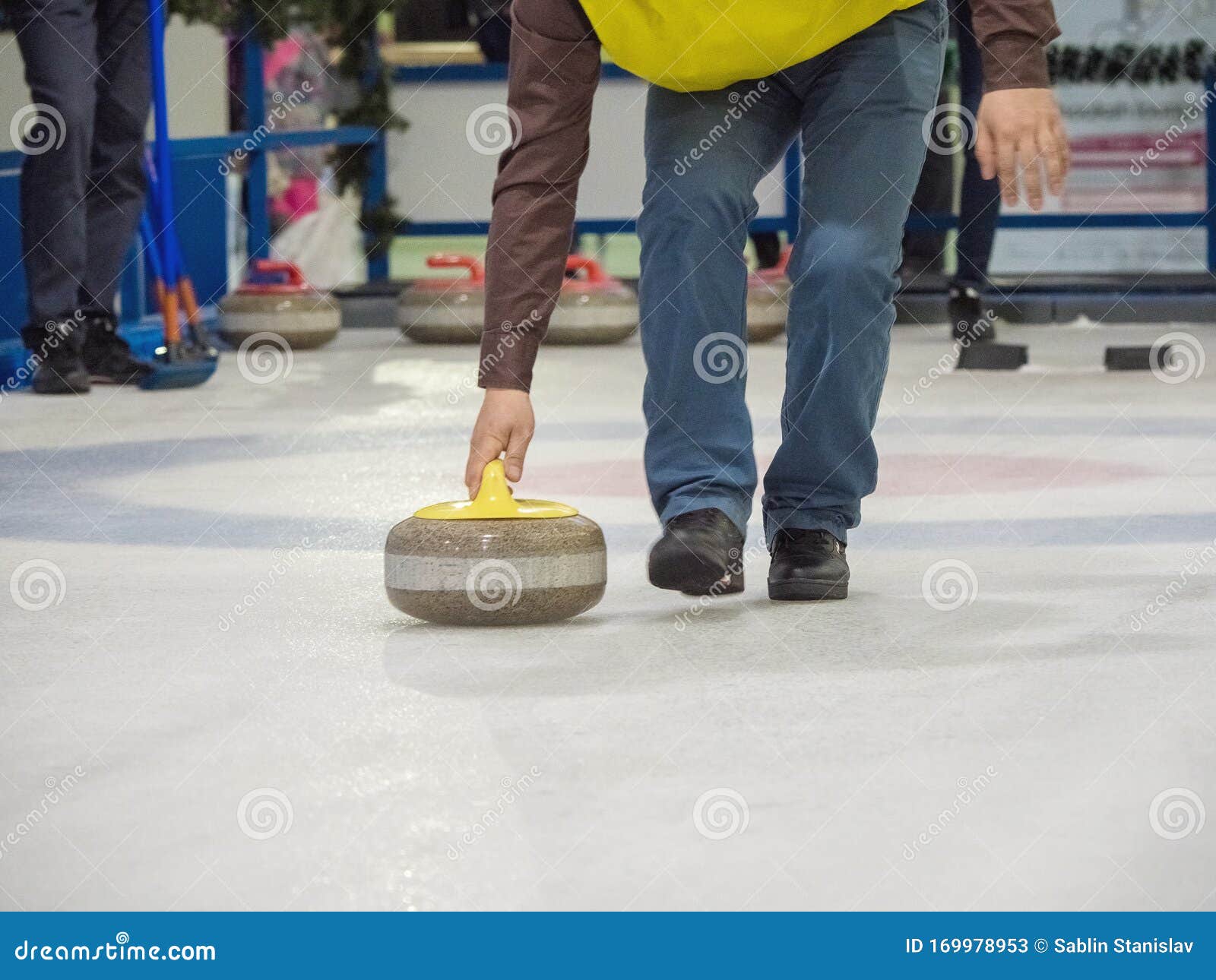 Curling Stone on Ice of a Indoors Rink. Stock Image - Image of blue ...
