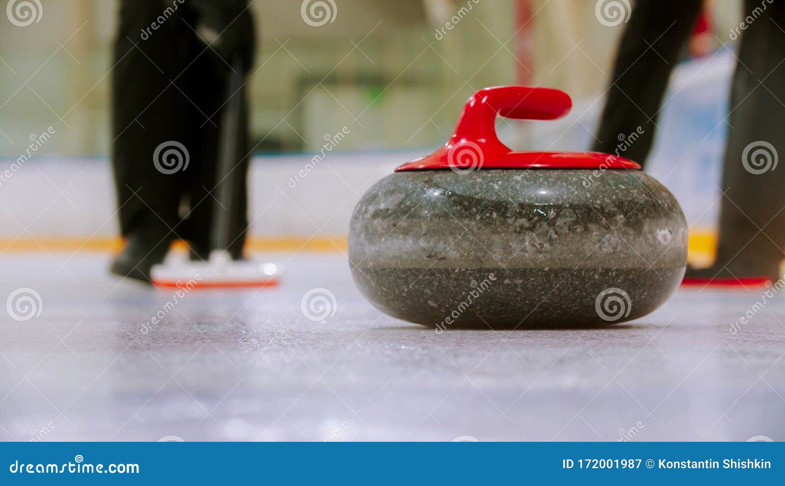 Curling Training - a Granite Stone with Red Handle on the Ice Field ...