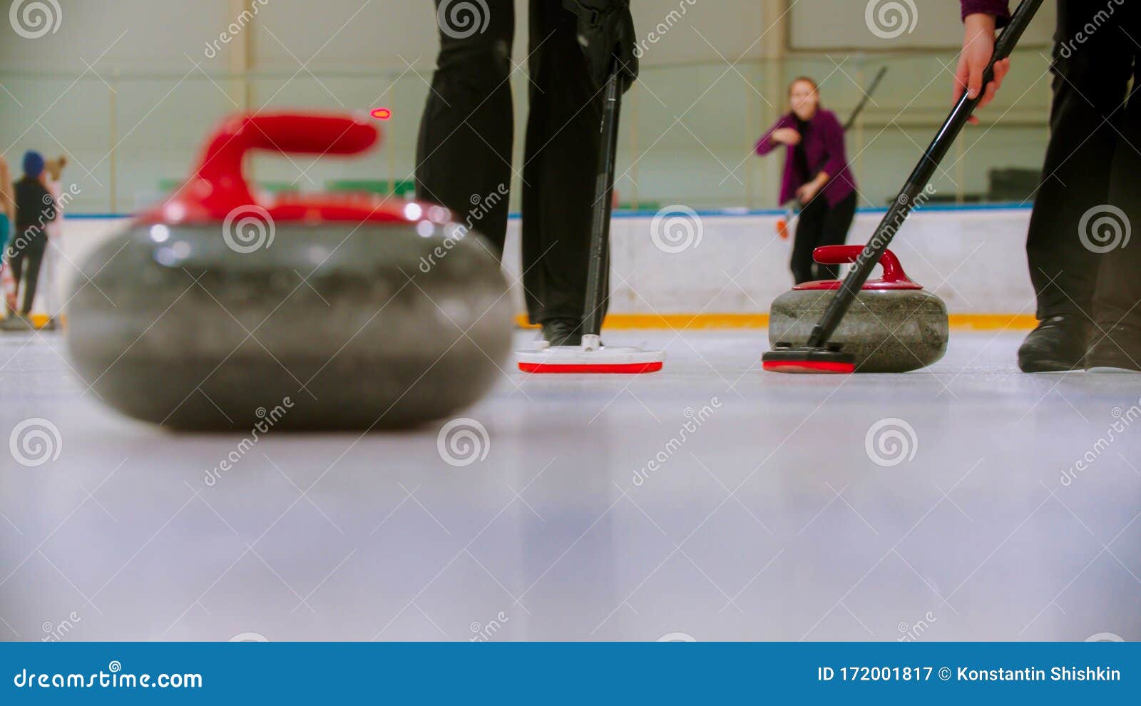 Curling Training on the Ice Rink- a Granite Stone Biter with Red Handle ...