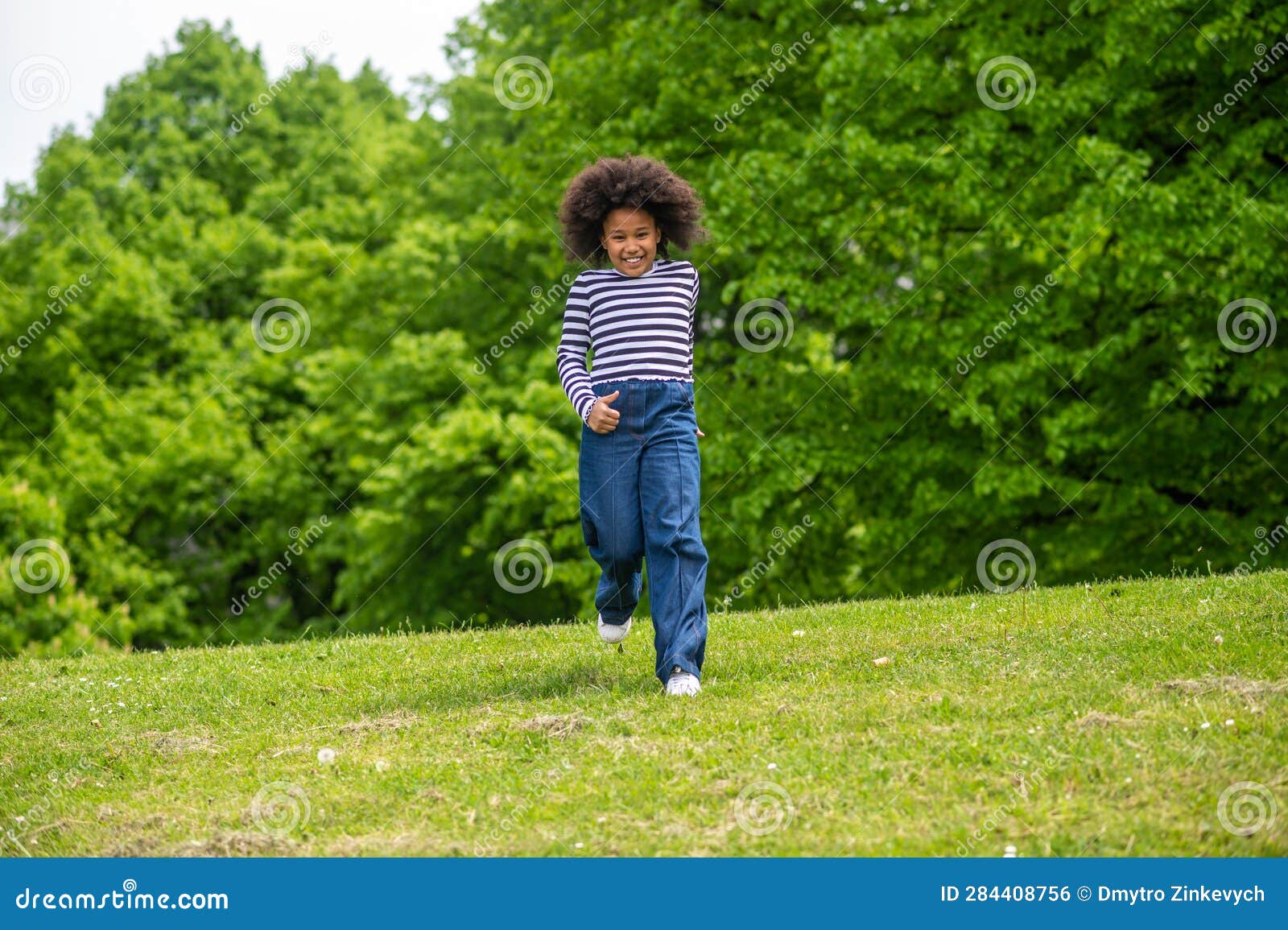 Curly-haired Cute Kid Running and Feeling Excited Stock Photo - Image ...