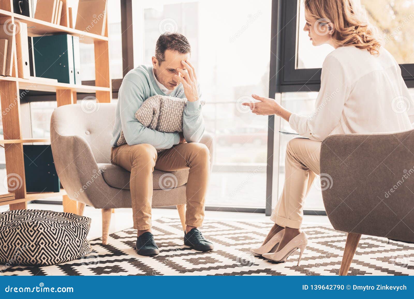 Curly-haired Psychoanalyst Speaking To Her Client Stock Photo - Image ...