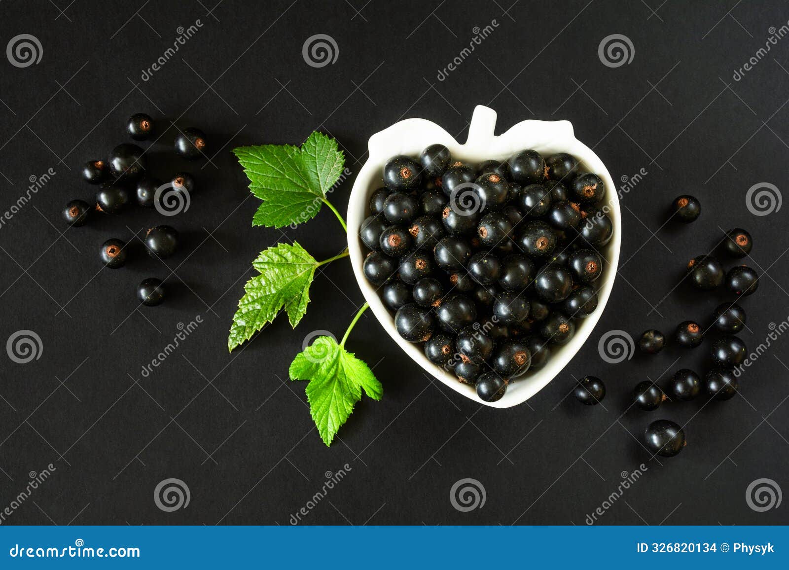 Currant Berries in a White Berry-shaped Bowl on a Black Surface Stock ...