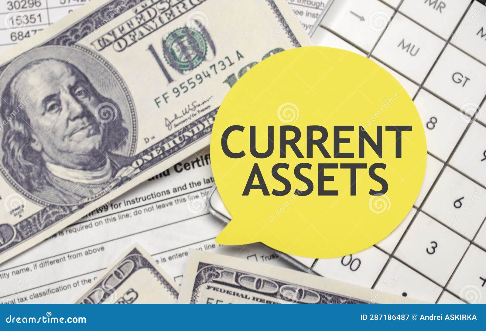 CURRENT ASSETS Words on Yellow Sticker with Dollars and Charts Stock ...