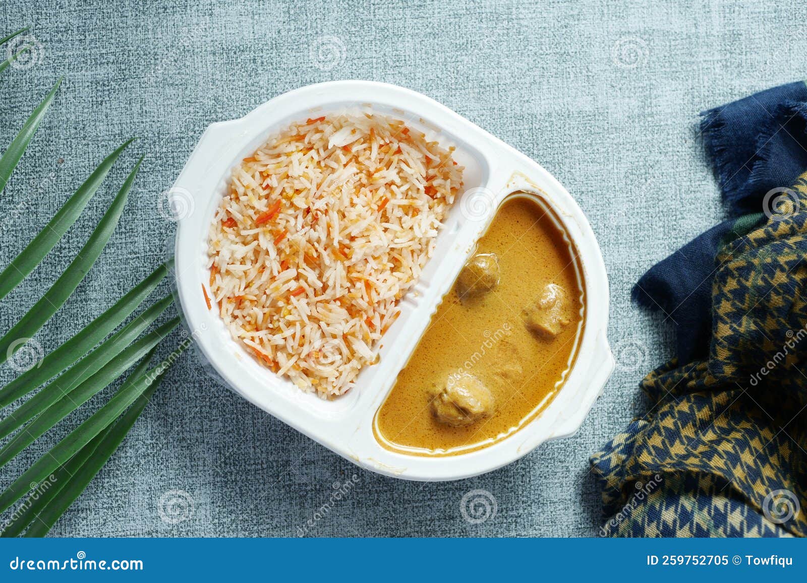 Curry Chicken and Rice in a Take Away Plastic Packet on Table Stock ...