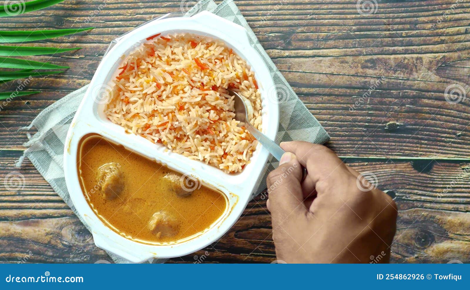 Curry Chicken and Rice in a Take Away Plastic Packet on Table Stock ...