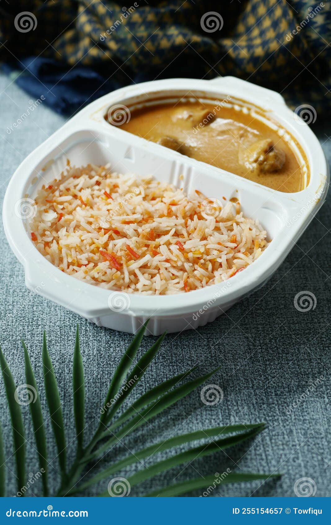 Curry Chicken and Rice in a Take Away Plastic Packet on Table Stock ...