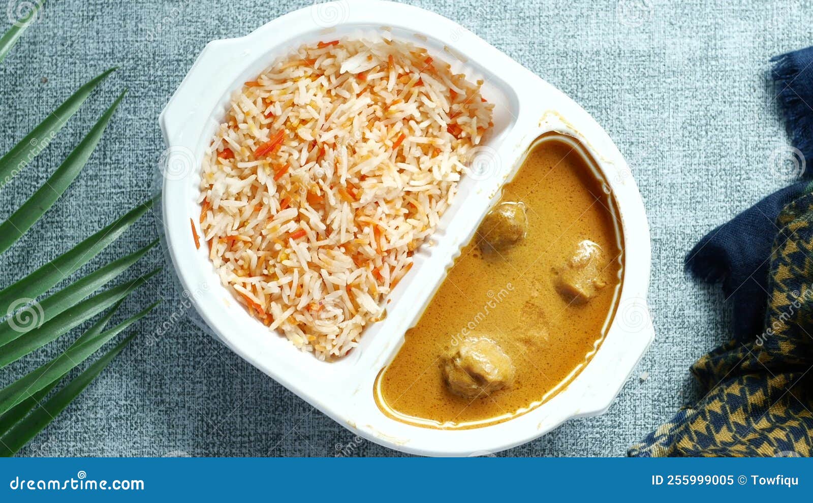 Curry Chicken and Rice in a Take Away Plastic Packet on Table Stock ...