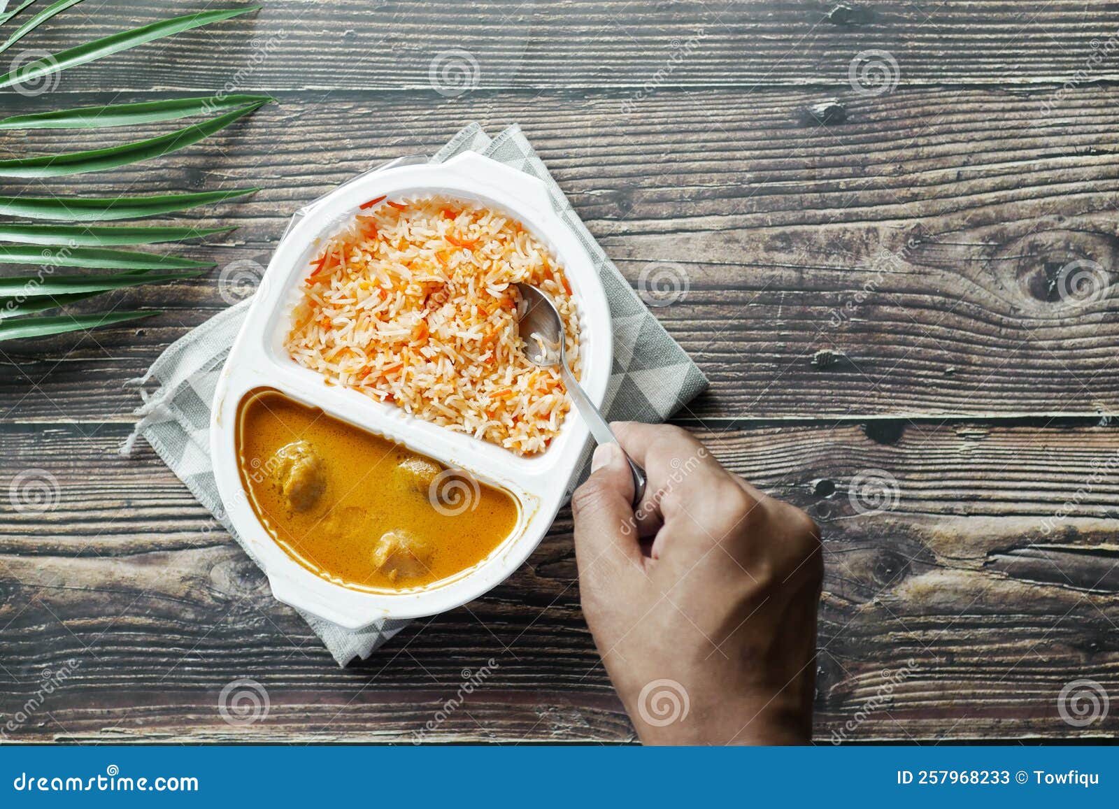 Curry Chicken and Rice in a Take Away Plastic Packet on Table Stock ...