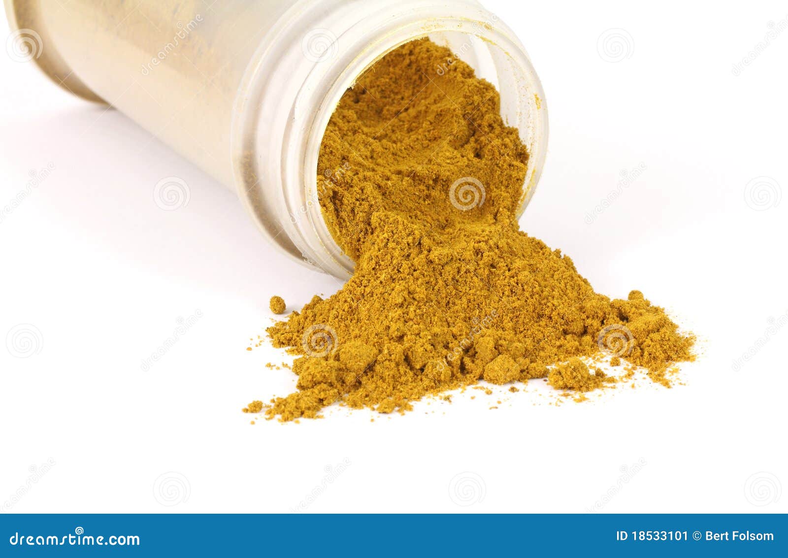 Curry powder spilling stock image. Image of container - 18533101