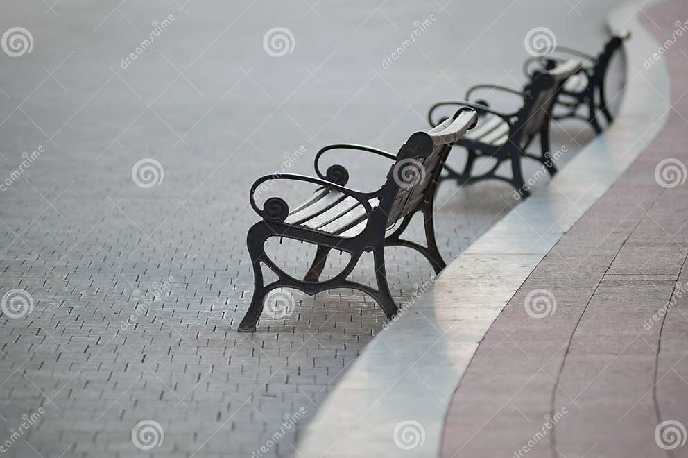Curve of benches stock photo. Image of design, cobbled - 24186114